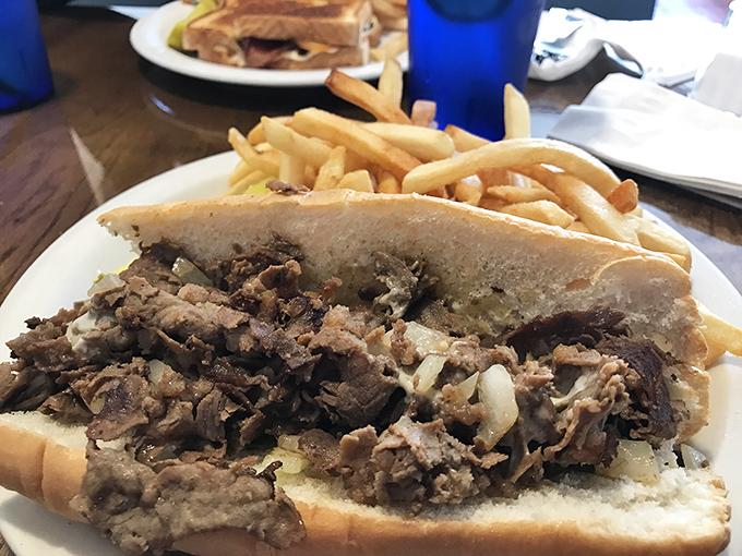A cheesesteak that doesn't need Philadelphia's permission to be magnificent. Those caramelized onions and tender beef have found their perfect bread home.