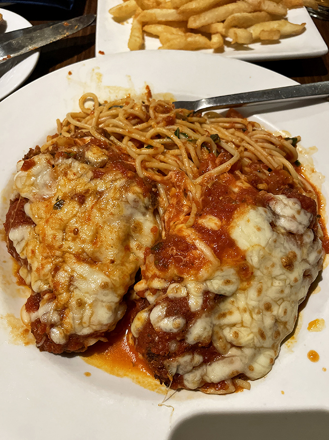 Chicken Parmesan that doesn't know it's supposed to be humble&mdash;melted cheese cascading over marinara like it's auditioning for a food magazine.
