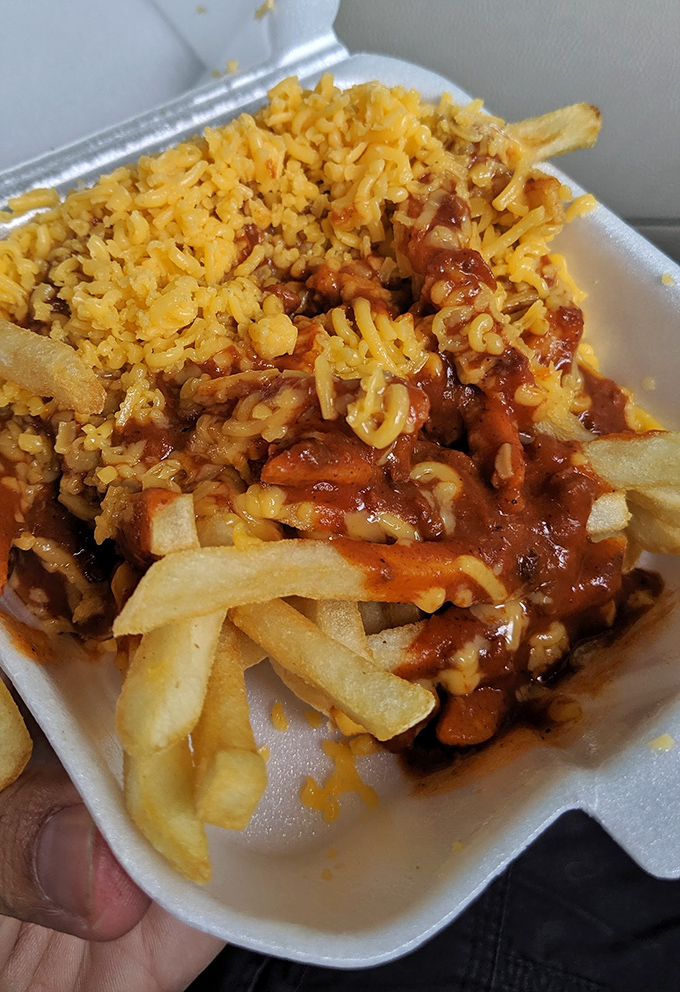 Chili cheese fries that require both a fork and dedication&mdash;a glorious mess that's worth every napkin you'll need afterward.