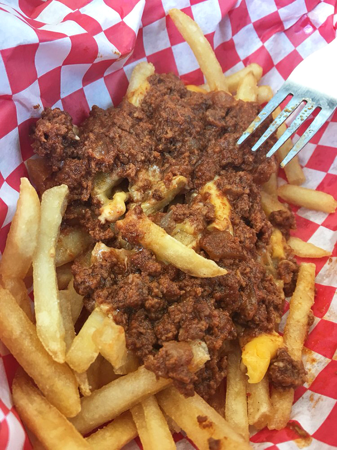 Chili cheese fries: where comfort food goes to graduate school, earning advanced degrees in heartiness and flavor with each messy, magnificent bite.