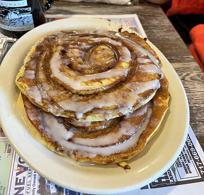 This cinnamon roll pancake stack isn't just breakfast&mdash;it's an event. The spiral of cinnamon and glaze creates a hypnotic effect that renders willpower useless.