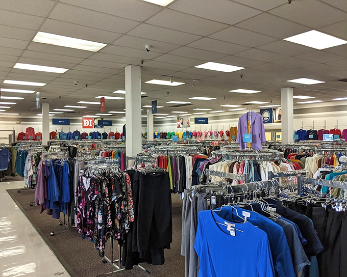 Clothing racks organized with military precision. Unlike your closet at home, everything here has a place, making the hunt for hidden gems surprisingly efficient.