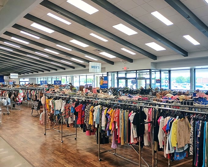 The men's section: where Hawaiian shirts and business attire live in peaceful harmony under those industrial-chic ceiling beams.