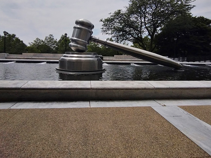 Even on cloudy days, this metallic behemoth commands attention, like a silver lining to the storm clouds of any legal troubles you might be facing.