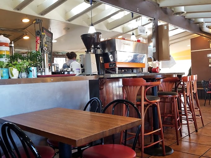 Coffee equipment standing at attention like caffeinated soldiers ready to battle your morning grogginess. The barista's command center of liquid motivation.