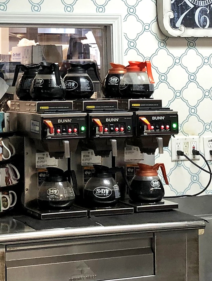 The coffee station&mdash;where the magic morning elixir flows freely. Three pots brewing means you'll never face the tragedy of an empty cup.