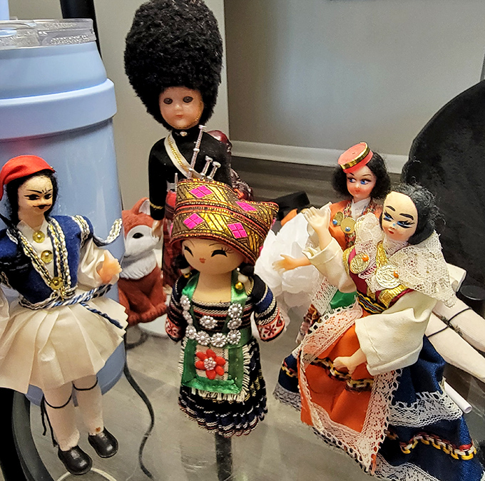 A multicultural gathering of vintage dolls stands in silent testimony to the fascinating finds that make thrift stores magical time capsules.