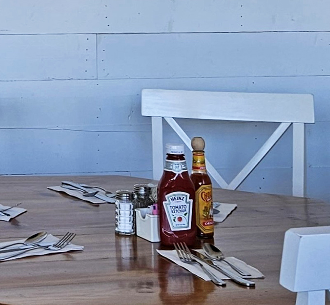 Every great breakfast deserves great condiments. The simple wooden table setting speaks to Southern Belle's unpretentious approach to dining excellence.