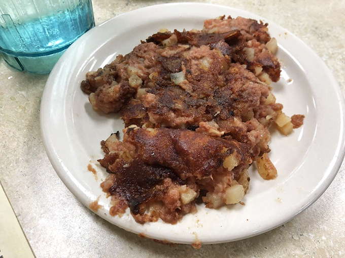 Corned beef hash with the perfect crispy-to-tender ratio—the breakfast equivalent of striking gold. This is the dish breakfast enthusiasts judge a diner by.