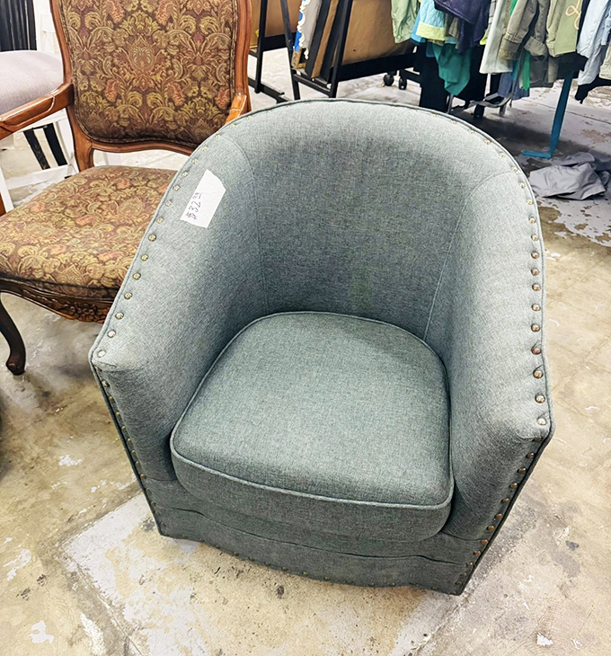 This stylish armchair didn't hear the news that it's supposed to be expensive. At AMVETS prices, it's practically begging to come home.