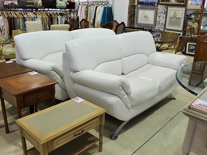 A pristine white leather sofa set awaits its forever home, proving that "pre-loved" can look post-luxury without the four-figure price tag.
