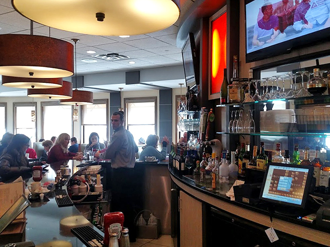 The beating heart of any great diner: a well-stocked bar where coffee flows freely and servers orchestrate the morning rush with the precision of symphony conductors.