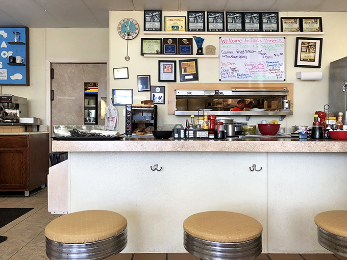 The counter where breakfast magic happens. Those stools have supported the weight of countless happy customers and their satisfied appetites.