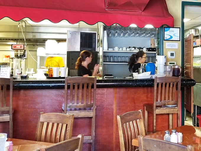 The heart of the operation. Where orders are called, jokes are shared, and regulars are greeted by name.