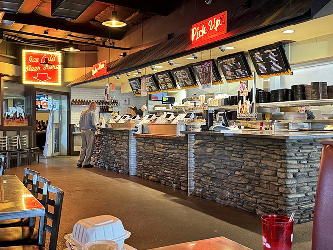 The ordering counter—where dreams are verbalized, hunger pangs begin their countdown to extinction, and life decisions are made.