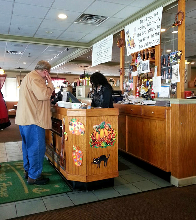 The host station decorated with seasonal touches says "we care about details" almost as loudly as it says "we've got homemade pie."