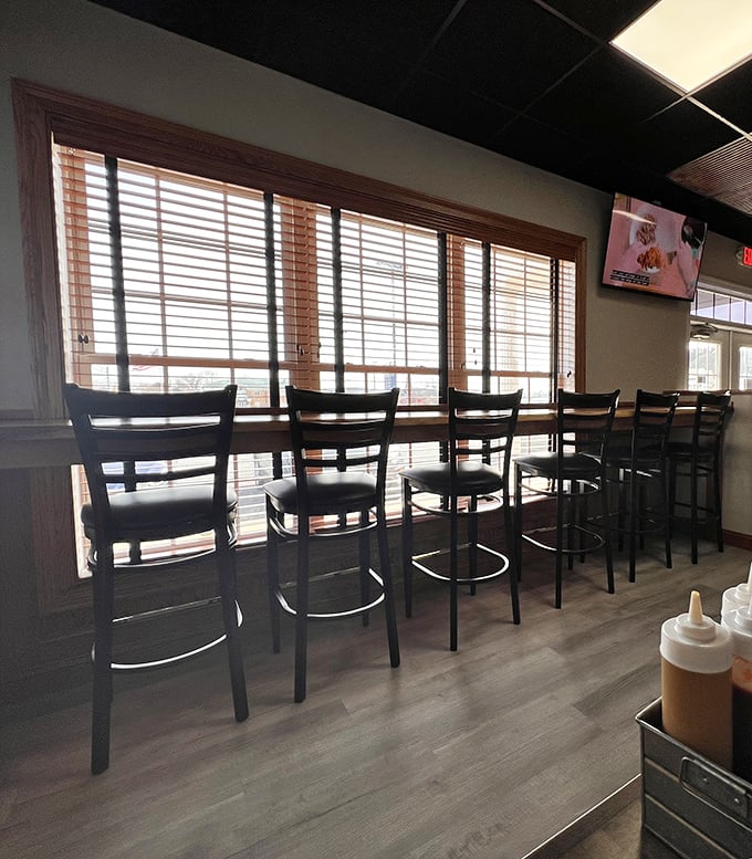 Counter seating with a view &ndash; where solo diners can commune with both their meal and fellow barbecue enthusiasts in peaceful harmony.