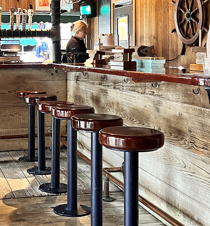 Counter seating: where solo diners become seafood scholars. These stools have supported generations of happy eaters contemplating their next bite.
