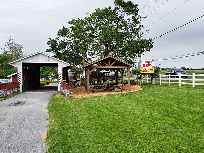 The entrance that promises adventure&mdash;a covered bridge and picnic area where your journey into Amish country begins.