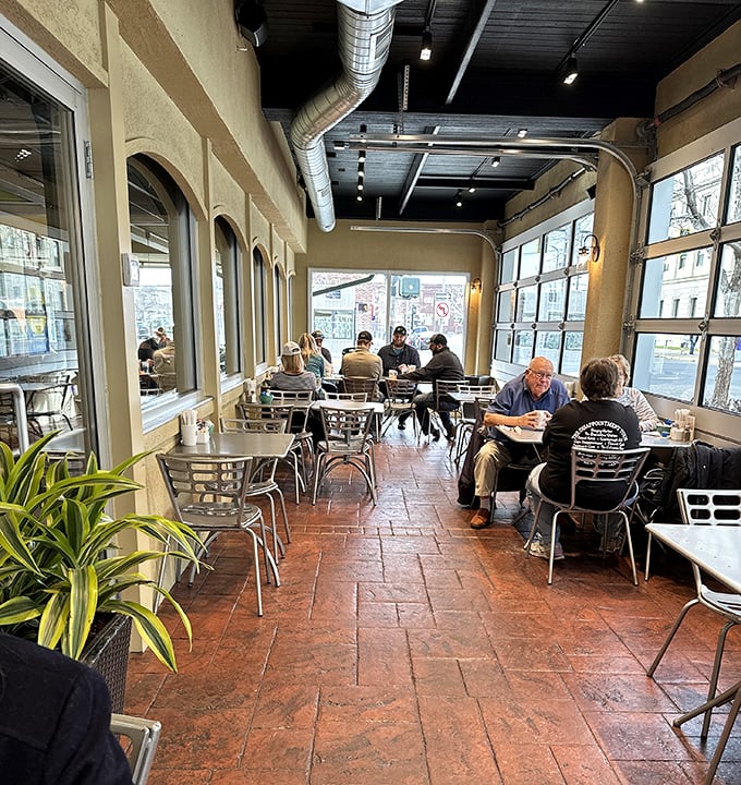 The sunlit indoor-outdoor space offers a bright alternative for those who prefer their coffee with a side of vitamin D.