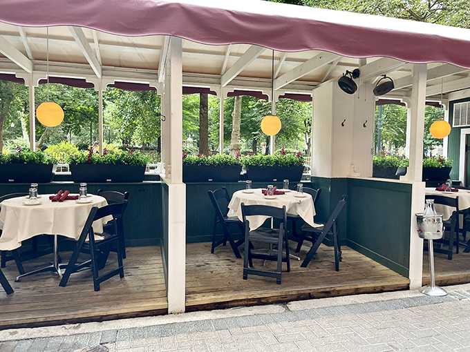 The covered outdoor seating area offers shelter from rain but never from the pleasure of dining al fresco, European-style.