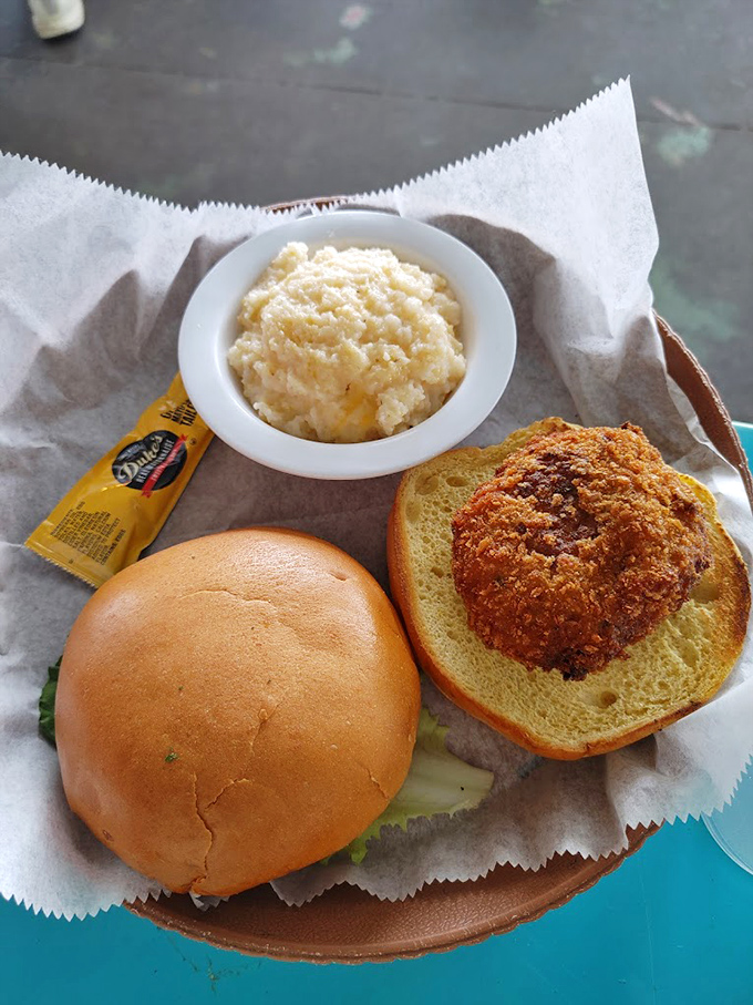 Grits and a crab cake sandwich—Southern comfort on a plate that makes you wonder why you'd ever eat anything else.