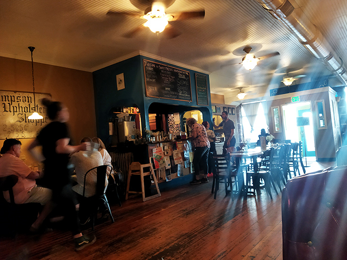 The dining room hums with the universal language of good food, where strangers become friends over shared recommendations and satisfied sighs.