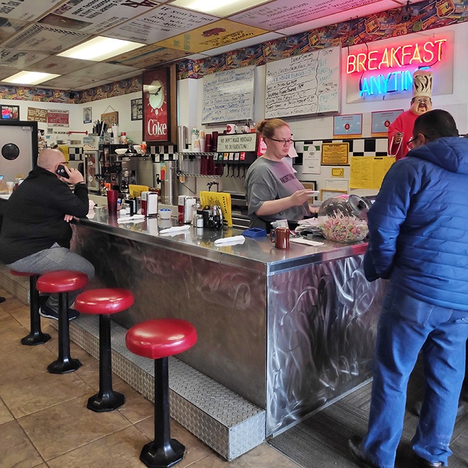 Counter seating where the real conversations happen - Jackson's morning parliament in full session. 
