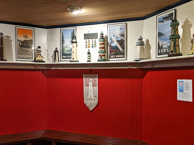 The lighthouse theme continues inside with a delightful collection of maritime memorabilia—because themed restaurants done right are pure joy.