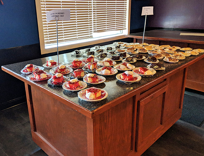 A dessert island of strawberry-topped treasures—because even the most dedicated seafood enthusiasts need a sweet finale.