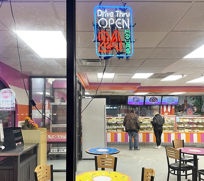 Behind the counter, the colorful striped theme continues, proving that at Amy's, even the work areas are part of the joyful experience.