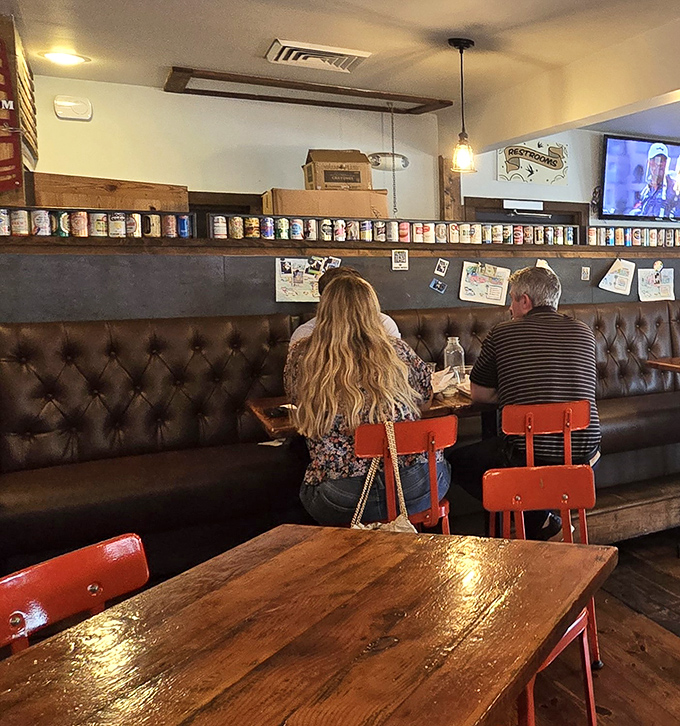 Beer can displays line the walls like trophies of hops conquests past, while diners plot their next delicious move.