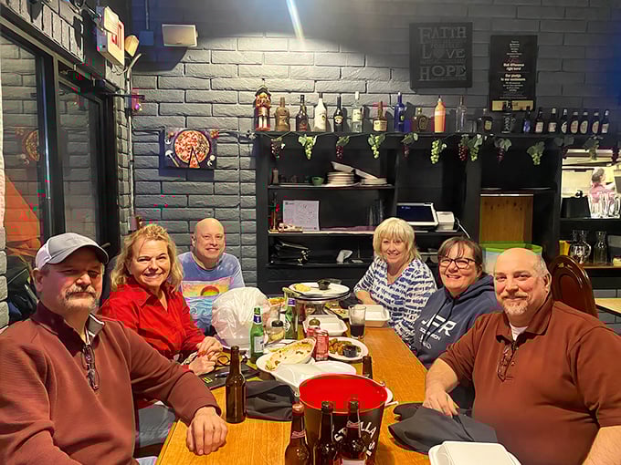 The true measure of a neighborhood restaurant: tables filled with friends sharing meals, stories, and genuine laughter.