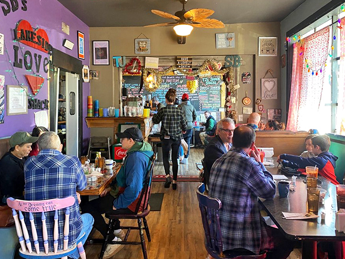 The true measure of a breakfast joint: locals in plaid shirts deep in conversation, solving world problems one pancake at a time.