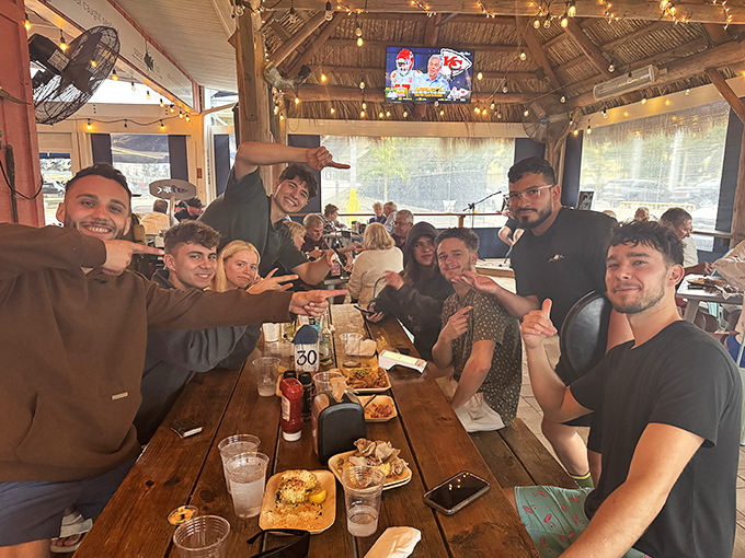 Happy diners raising glasses together is the universal language of discovering somewhere truly special and worth celebrating.