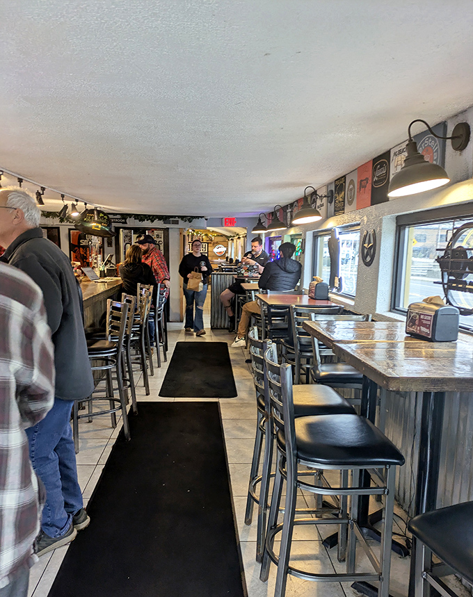 Where barbecue pilgrims gather at the altar of smoked meats, patiently waiting for their reward after the long, aromatic journey.