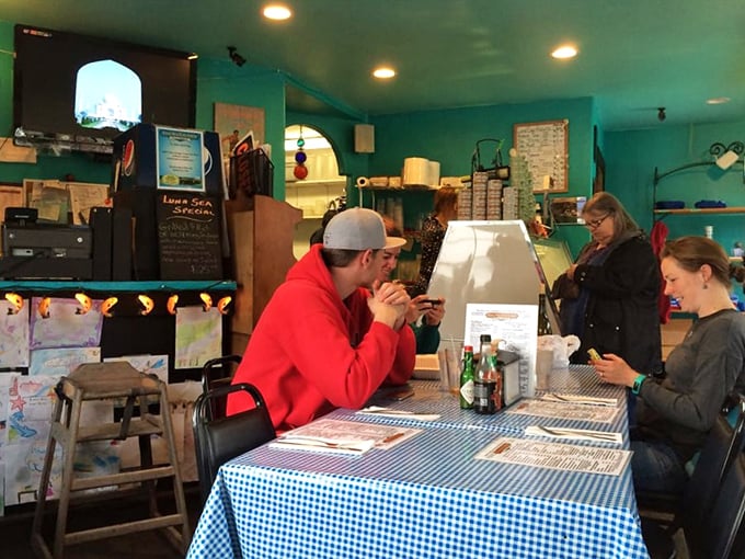 Blue checkered tablecloths and coastal-colored walls create the perfect backdrop for seafood memories. No pretension, just pure Oregon authenticity.