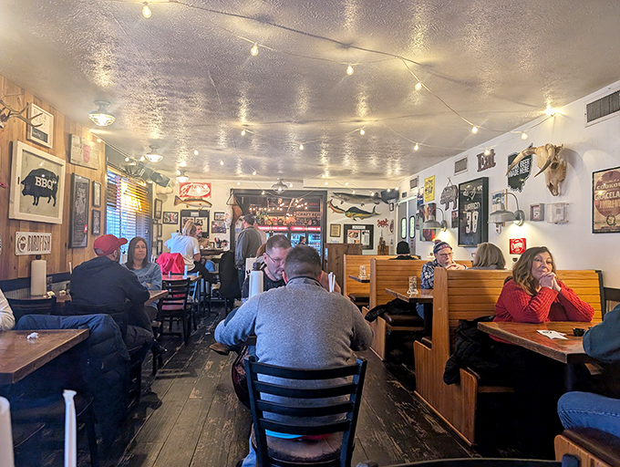A dining room filled with the universal expression of barbecue bliss&mdash;that quiet, focused concentration that happens when the food deserves your full attention.