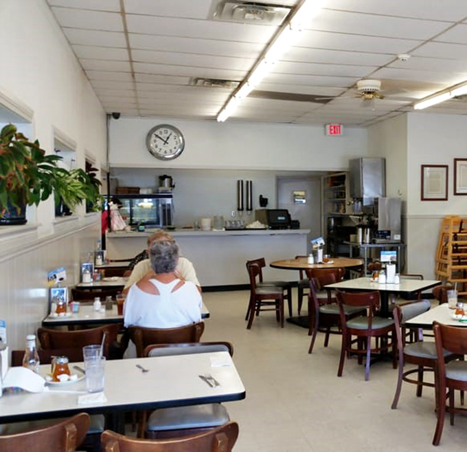 The morning rhythm of Savoy &ndash; regulars enjoying unhurried meals in a space where conversation flows as freely as the coffee.