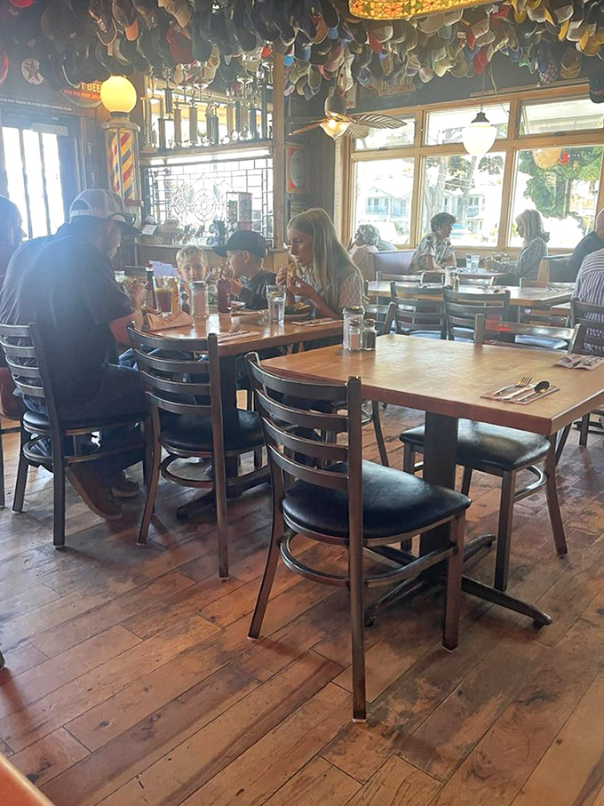 Families gather under a canopy of caps, creating memories over plates of comfort food. These tables have witnessed first dates, anniversaries, and "just because" Tuesday lunches.