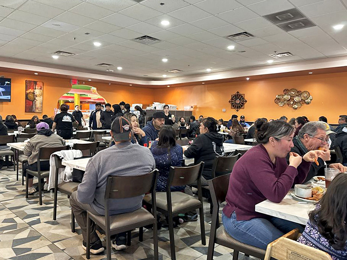 A packed house of happy diners proves the universal truth: good food at fair prices will always draw a crowd. Community forms around shared pleasures.