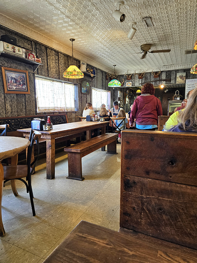 Wooden benches and colorful lampshades create the perfect backdrop for making memories over meals that matter.