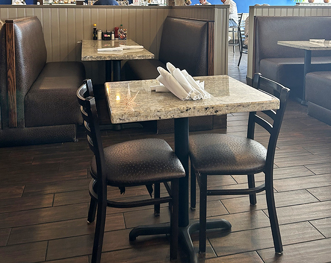Clean lines, comfortable seating, and granite tabletops—because good breakfast deserves better than wobbly tables and uncomfortable chairs.
