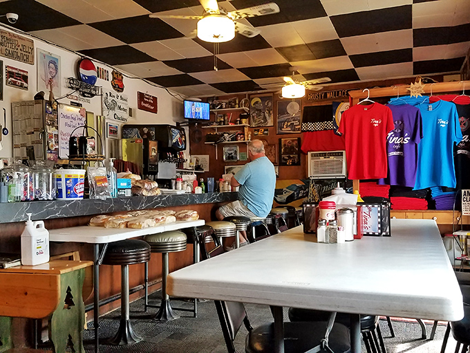 Simple tables, classic diner stools, and walls covered in memories&mdash;this isn't interior design, it's comfort architecture at its finest.