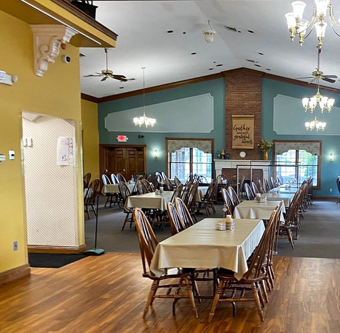 The dining room awaits with its warm colors and wooden chairs. Like Sunday dinner at grandma's, if grandma could seat 100 people at once.