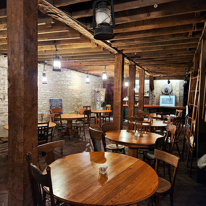 Round tables in the stone-walled dining area invite conversation as naturally as the food invites appreciation.