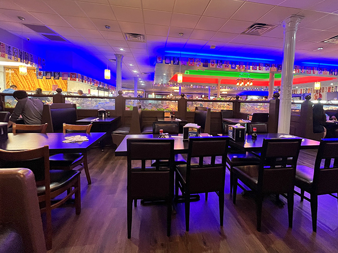 Comfortable booths bathed in blue light create the perfect setting for multiple trips to the buffet. Strategic seating is half the battle.