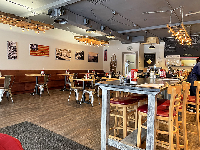 Modern meets homey with wooden floors, industrial lighting, and comfortable seating that encourages you to linger over that second coffee.