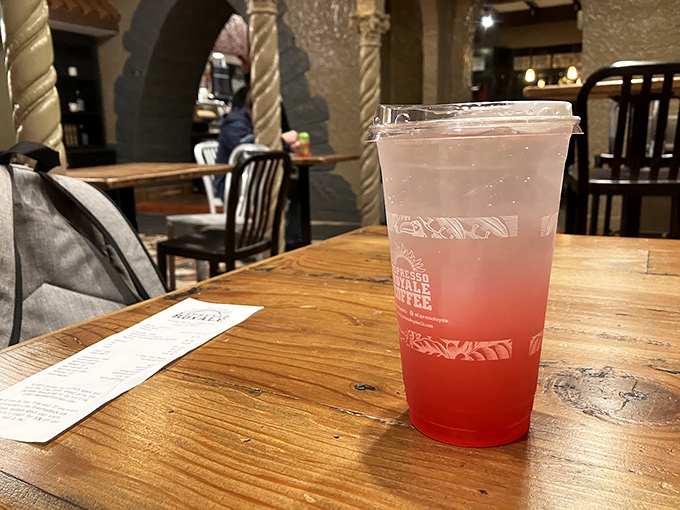 Even their drinks get the special treatment. This ruby-hued refresher sitting on rustic wood is the perfect sidekick to whatever you're ordering.