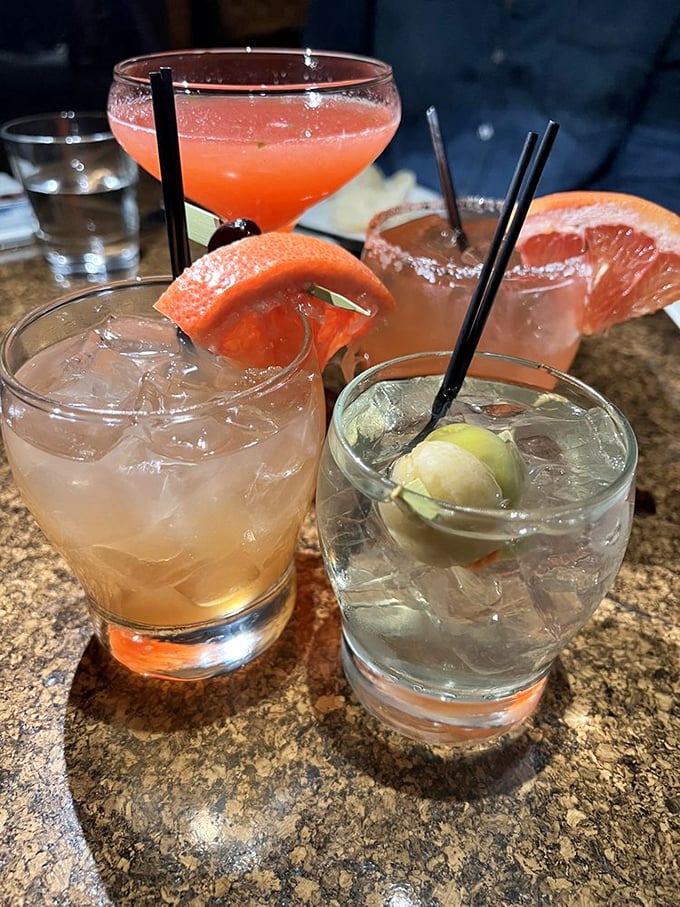 Cocktails arranged like a color wheel of possibilities, each promising its own unique adventure in a glass.